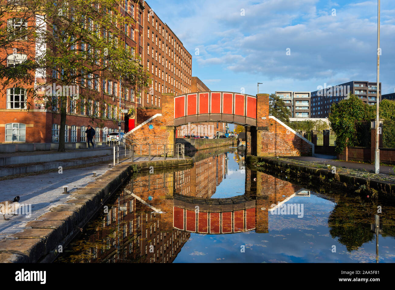 The Kitty Footbridge and the Royal Mill reflected in the Rochdale Canal ...