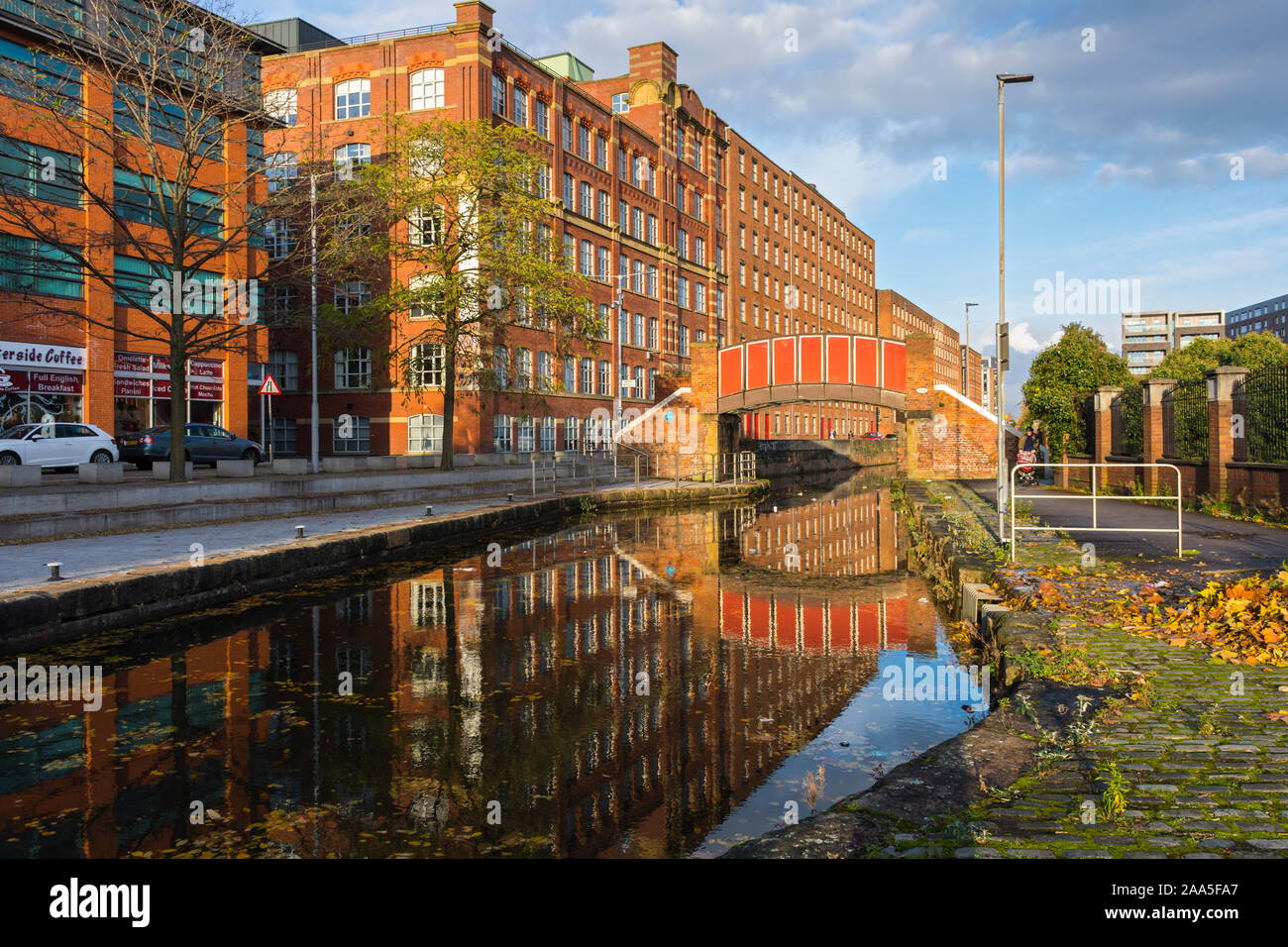 The Kitty Footbridge and the Royal Mill reflected in the Rochdale Canal ...