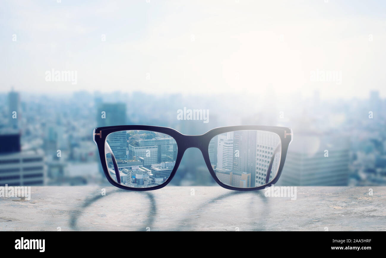 Glasses that correct eyesight from blurred to sharp Stock Photo - Alamy