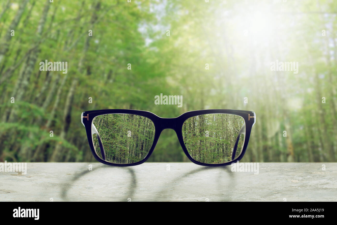 Glasses that correct eyesight from blurred to sharp Stock Photo - Alamy