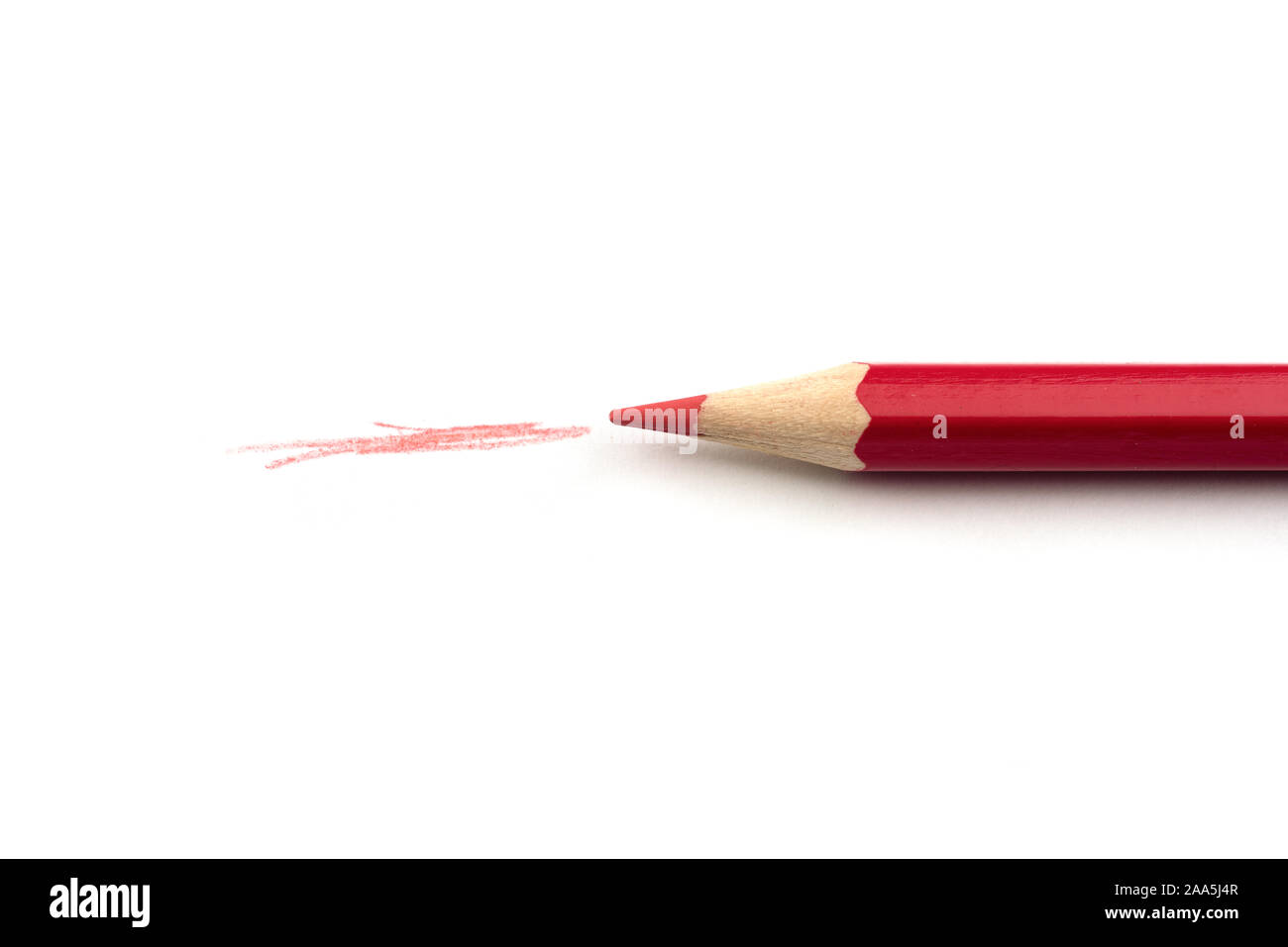 Red pencil drawing test on white paper. Close up. Copy space Stock ...