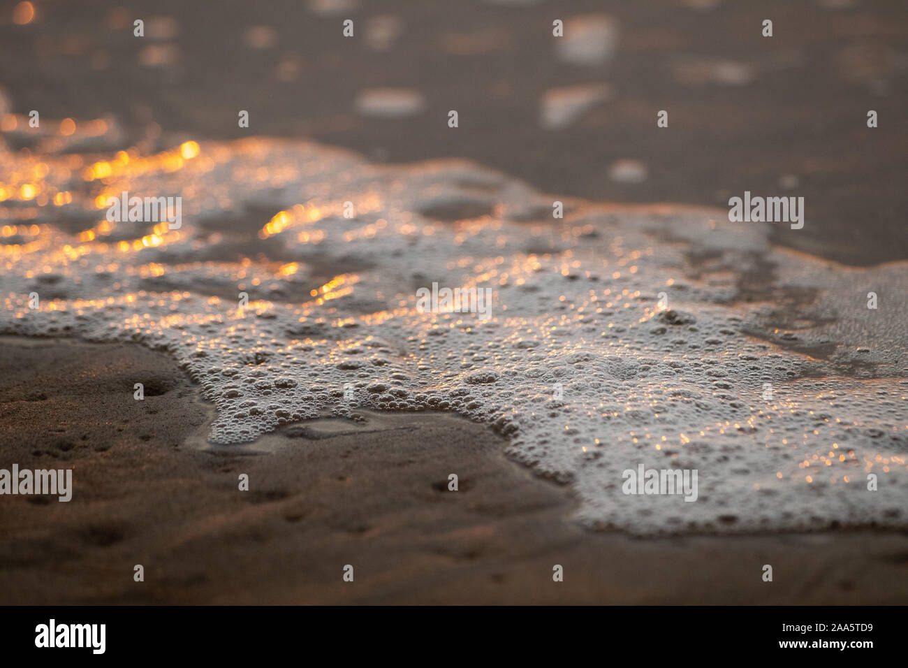 Beach sand water bubbles hi-res stock photography and images - Alamy