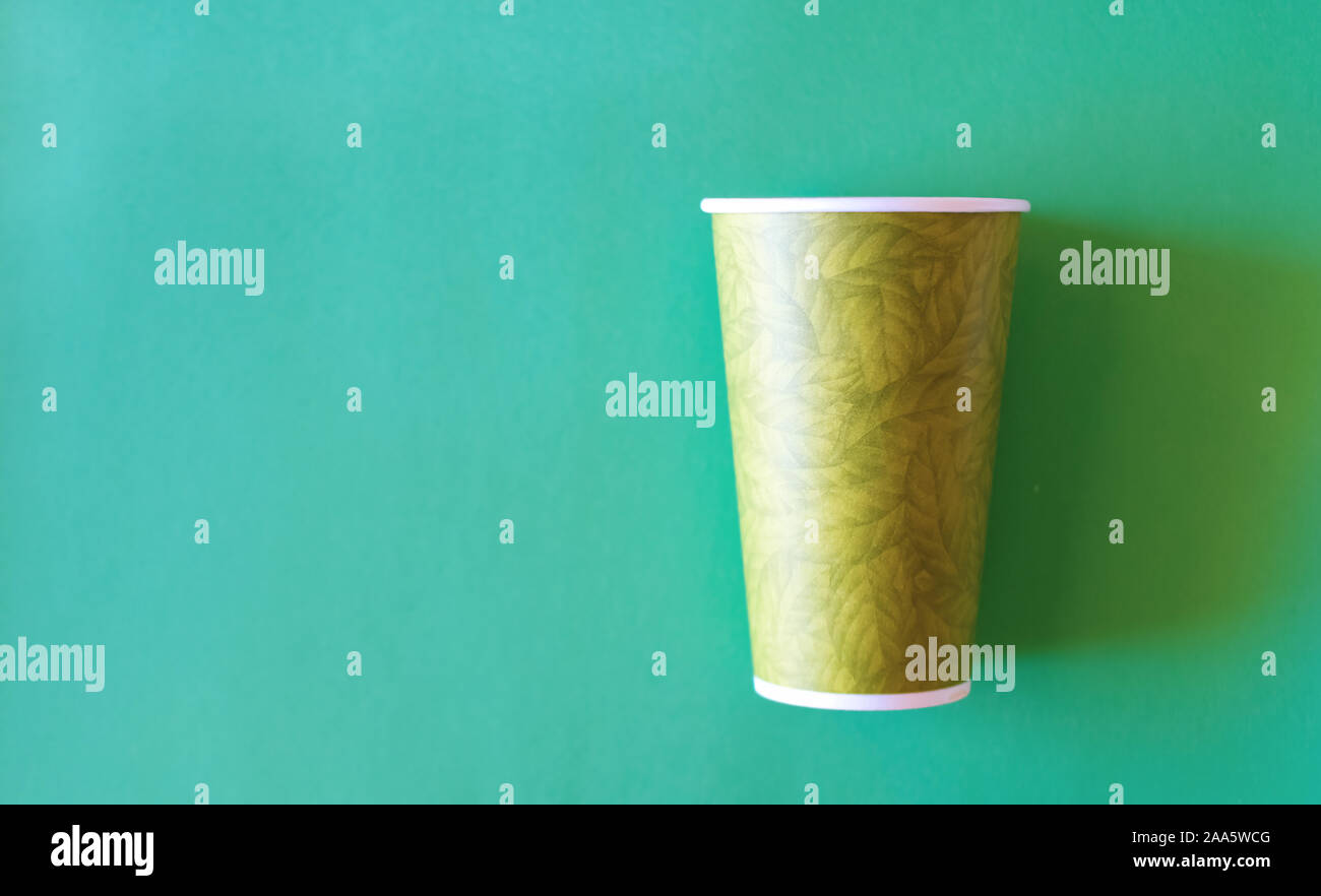 Green paper cup background Stock Photo - Alamy