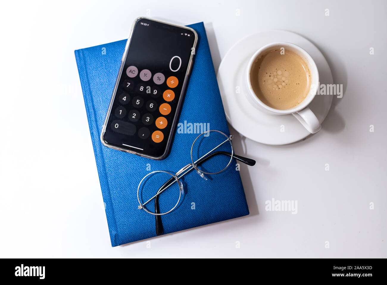 Calculating calculator hi-res stock photography and images - Alamy