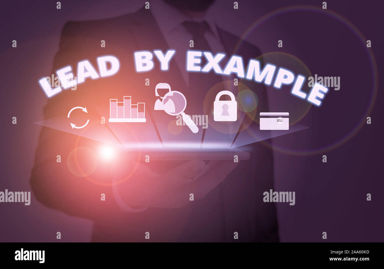 Writing note showing Lead By Example. Business concept for Be a mentor ...