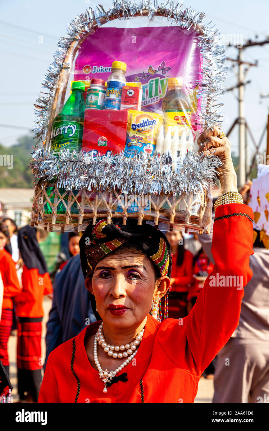 A Senior Danu Ethnic Minority Woman Carrys Offerings At The Annual ...