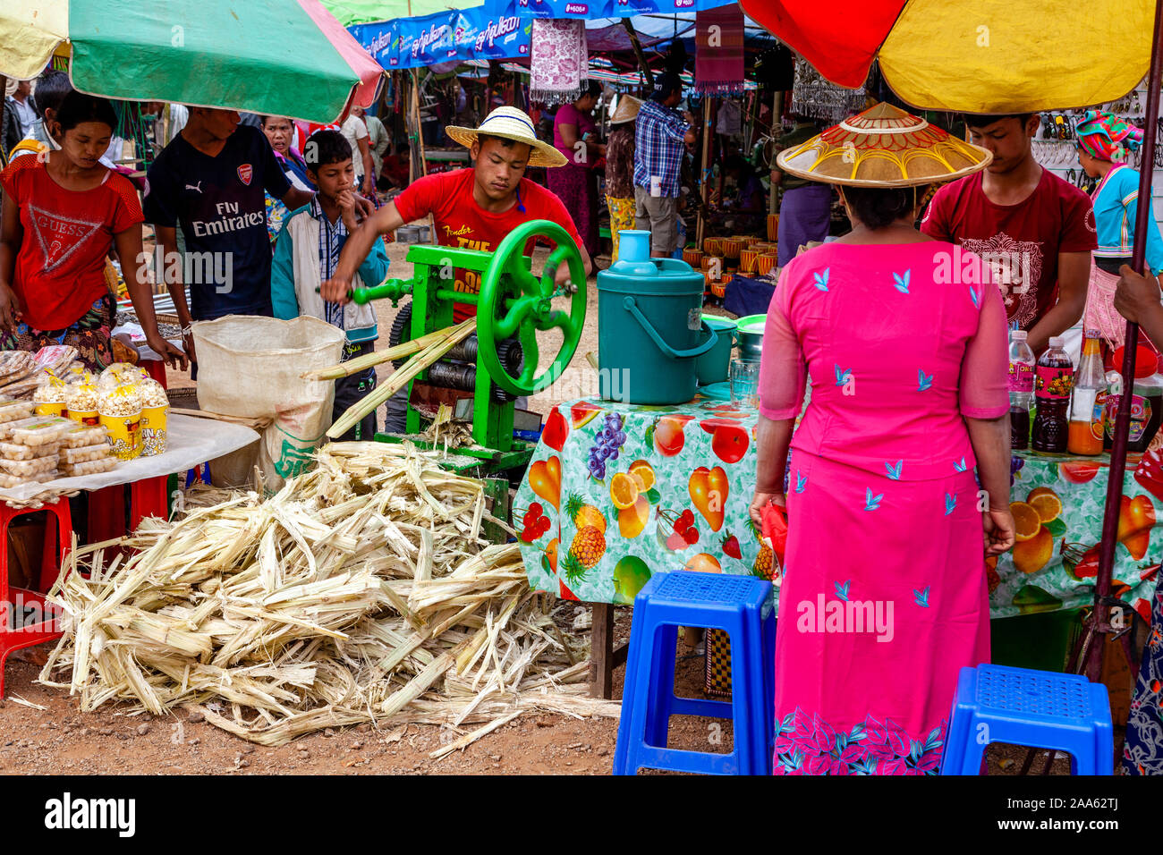 Burmese People Standing At A Sugar Cane Juice Stall, Pindaya, Shan ...