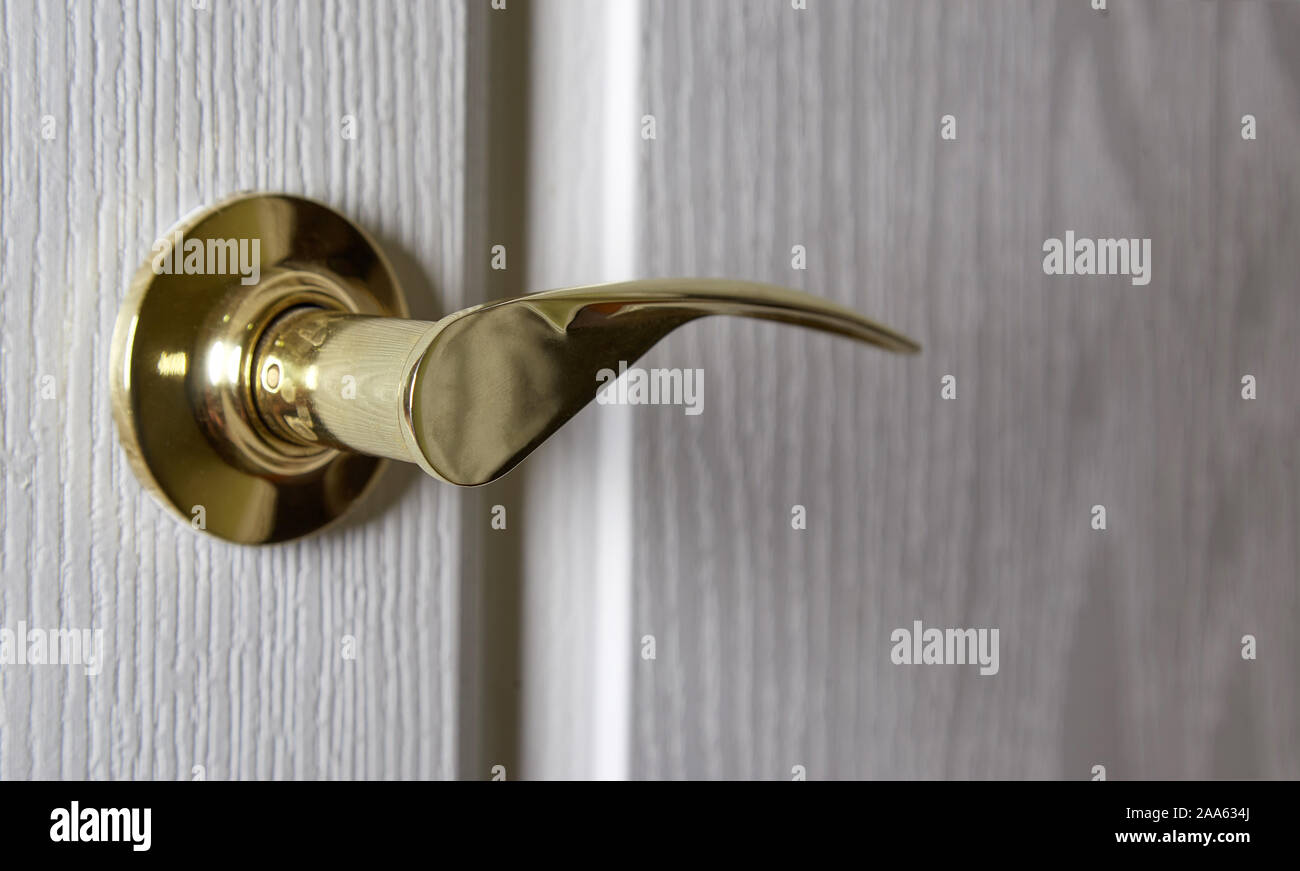 Closeup photo of metal door handle in modern style Stock Photo - Alamy