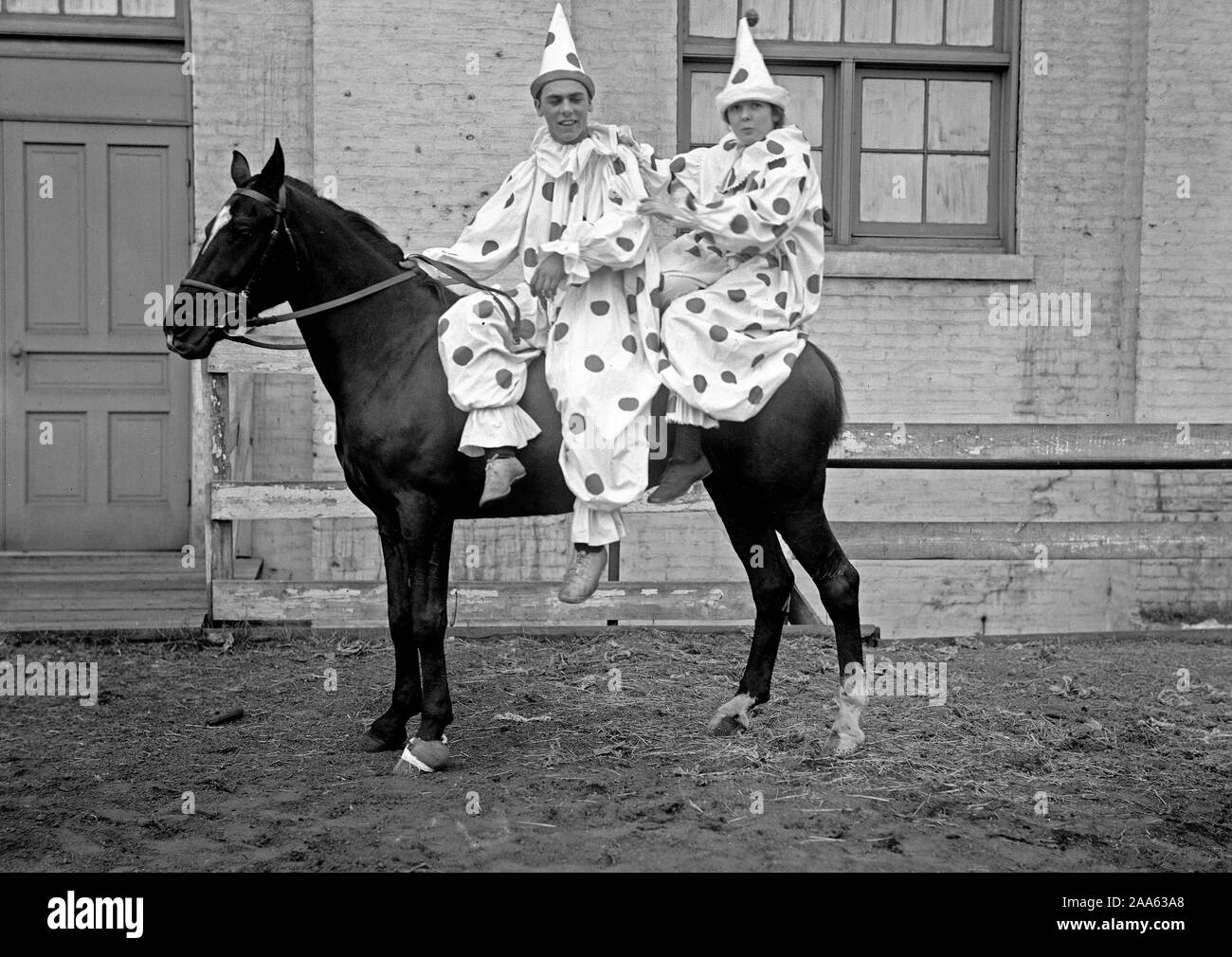 Early 1900s Clowns - Clowns riding on horse ca. 1915-1917 Stock Photo ...