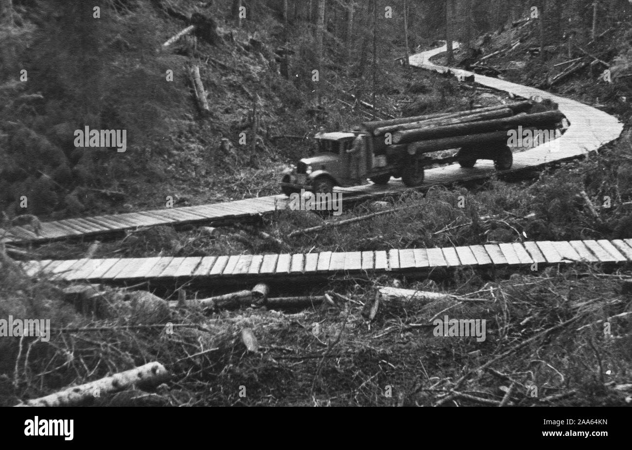 Truck loaded with logs on logging road in British Columbia, ca. 1936 ...
