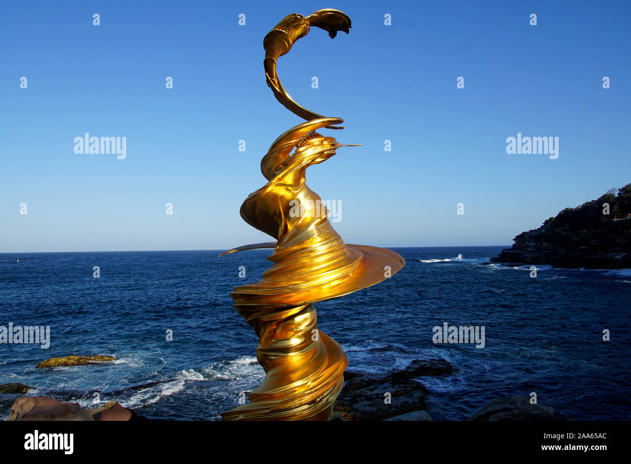 The Golden STATUE OF MAD LIBERTY by Wang Kaifang glistening against a ...