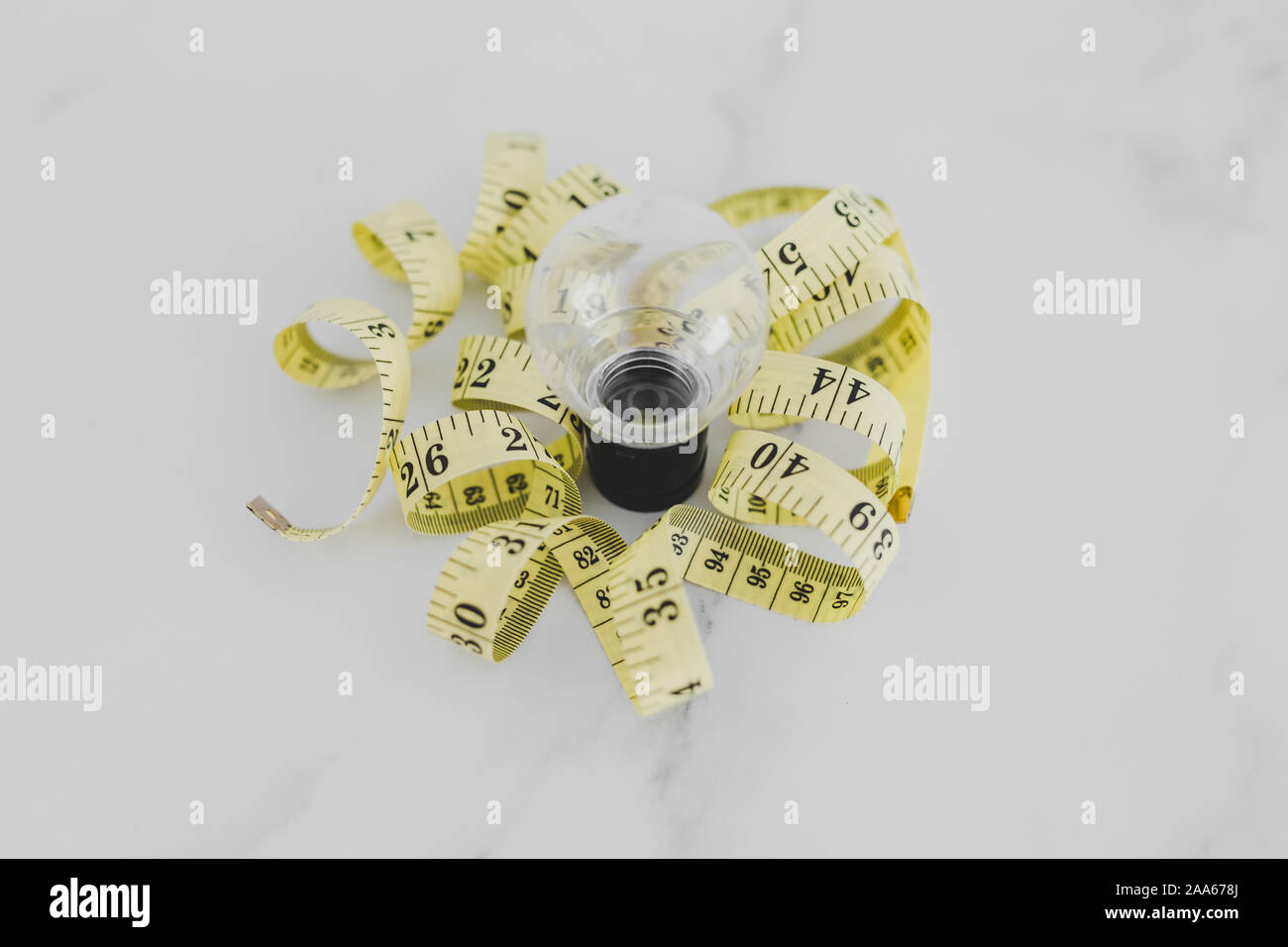 how big are your ideas conceptual still-life, lightbulb with measuring ...