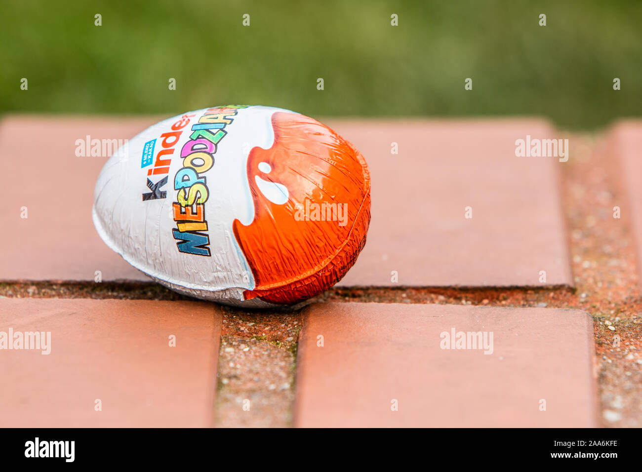 Kinder Surprise egg consists of a chocolate shell, plastic capsule with ...