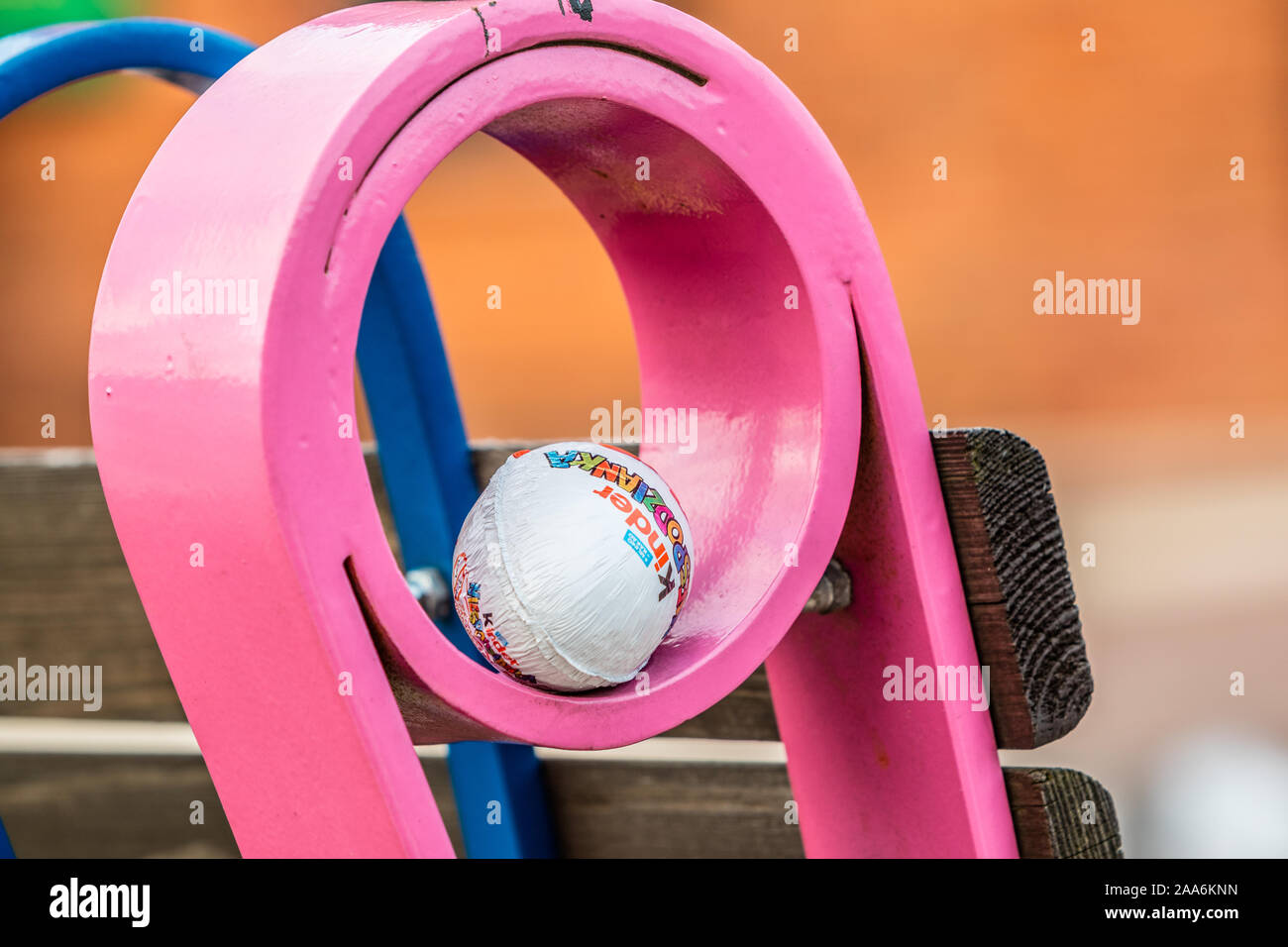 Kinder Surprise egg consists of a chocolate shell, plastic capsule with ...