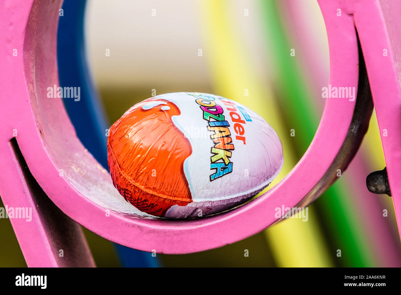 Kinder Surprise egg consists of a chocolate shell, plastic capsule with ...