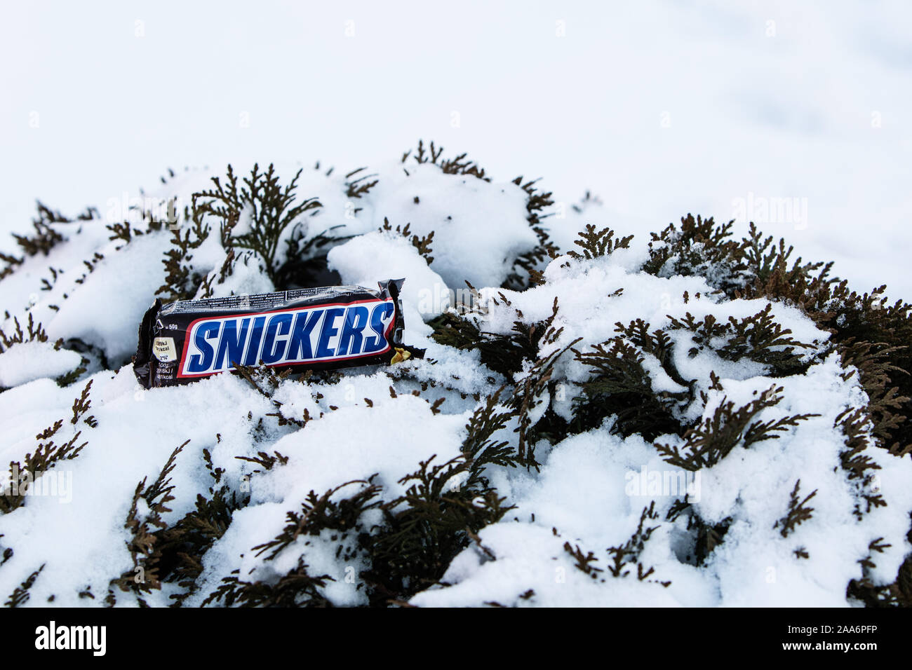 Snickers chocolate bar, winter, snow in background Stock Photo - Alamy