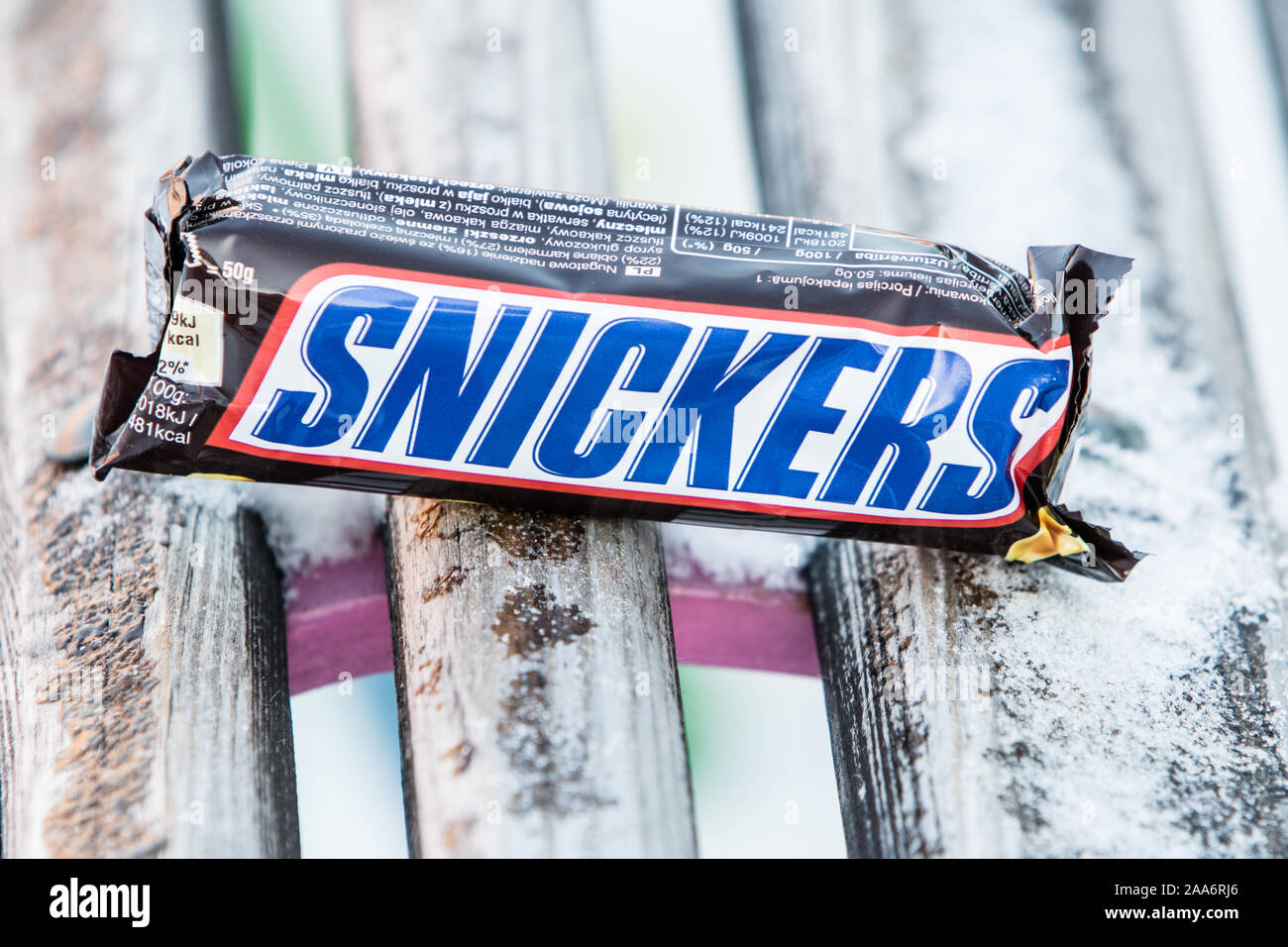 Snickers chocolate bar, winter, snow in background Stock Photo - Alamy