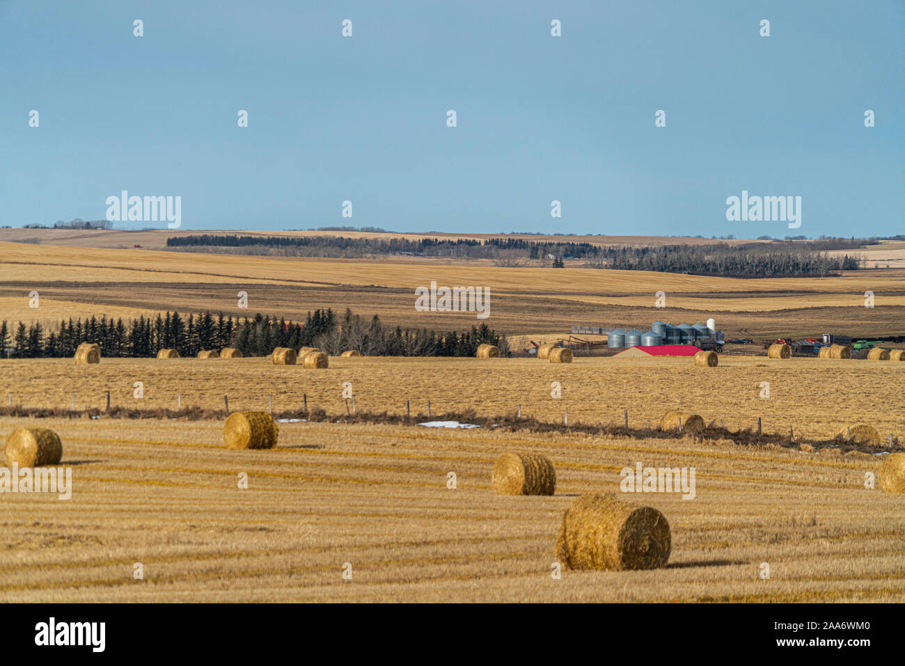 A Farm field in fall with bales of hay after the harvest Stock Photo ...