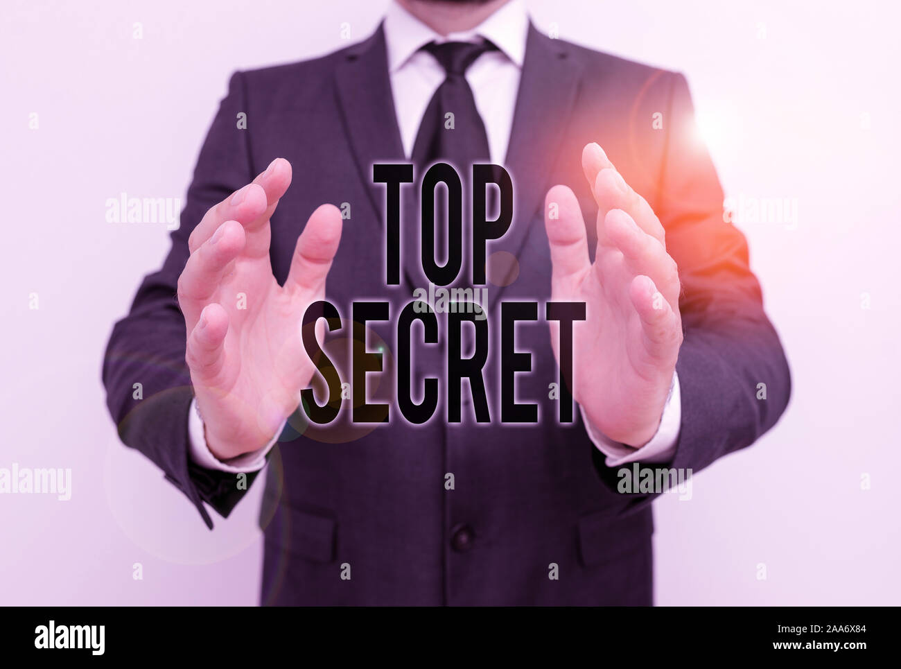Writing note showing Top Secret. Business concept for protected by a ...
