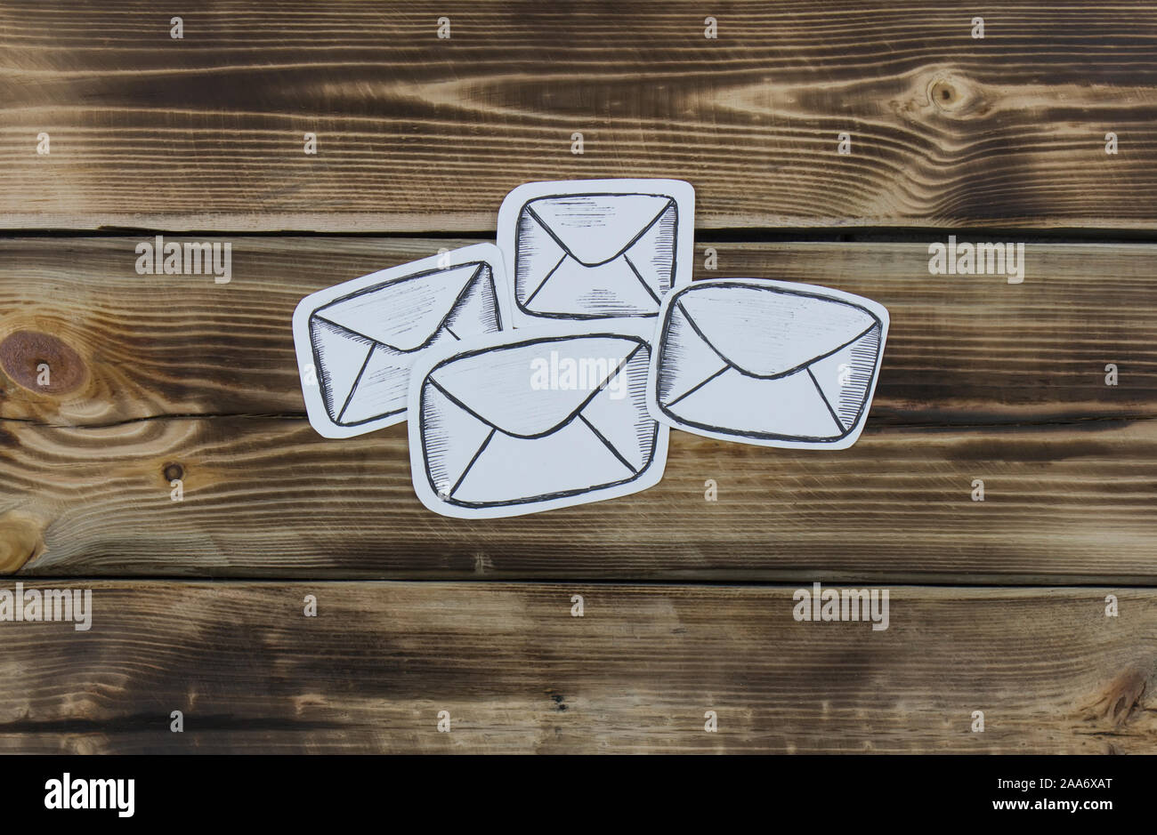 Paper sketched drawing with mail-themed letters on wooden Stock Photo ...