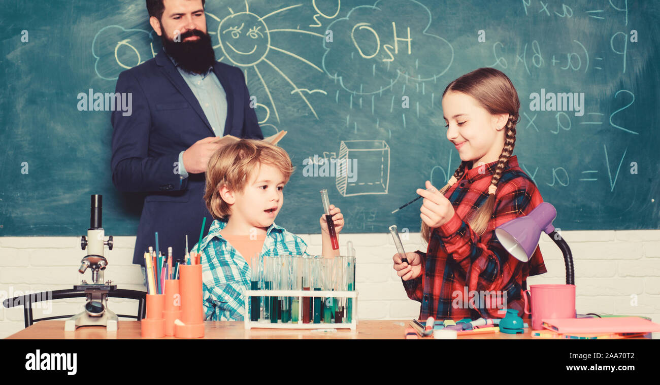 Confident medical experts. happy children teacher. doing experiments ...