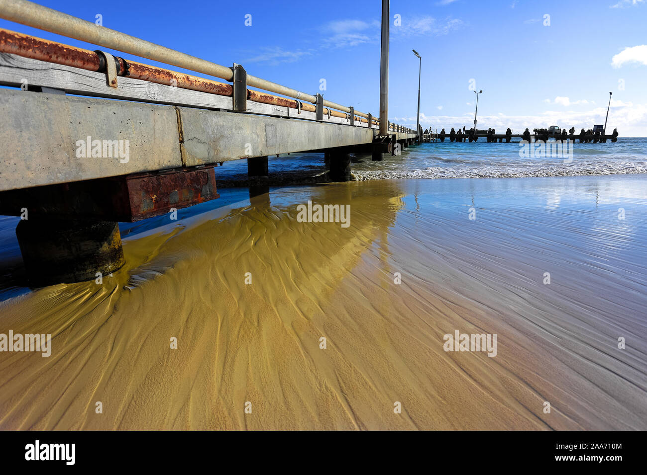 Tranquil boardwalk for rest and relax under blue sky with indian ocean ...