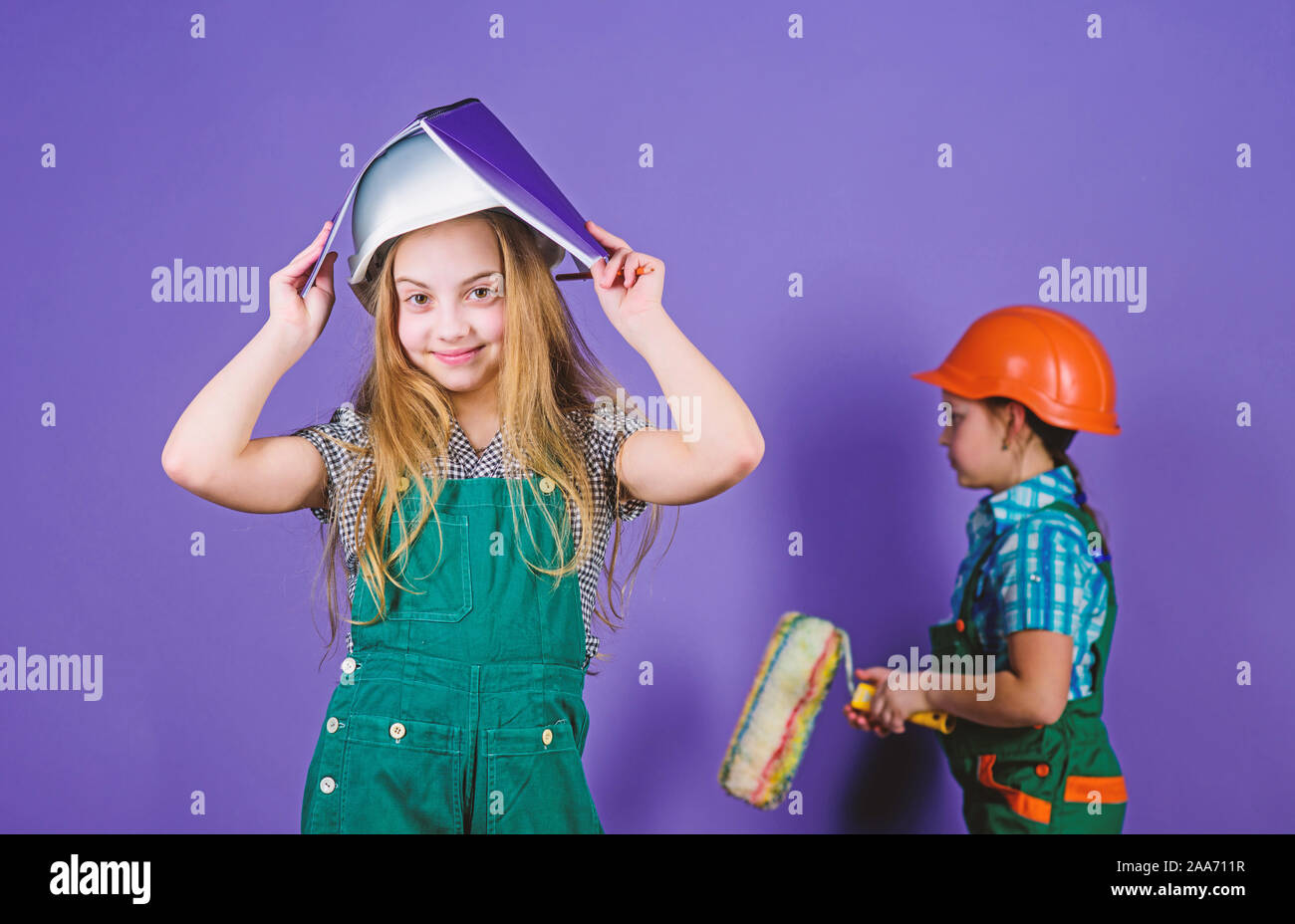 Future profession. small girls repairing together in workshop. Child ...