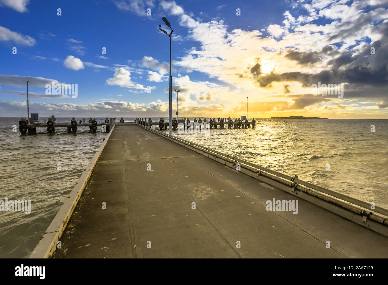 Tranquil boardwalk for rest and relax under blue sky with indian ocean ...