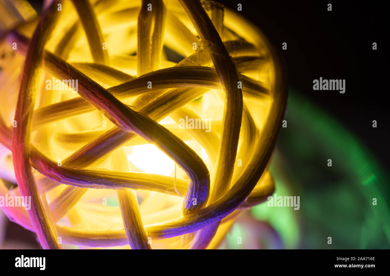 Yellow Christmas Lights Rattan Ball on Black Background Stock Photo - Alamy