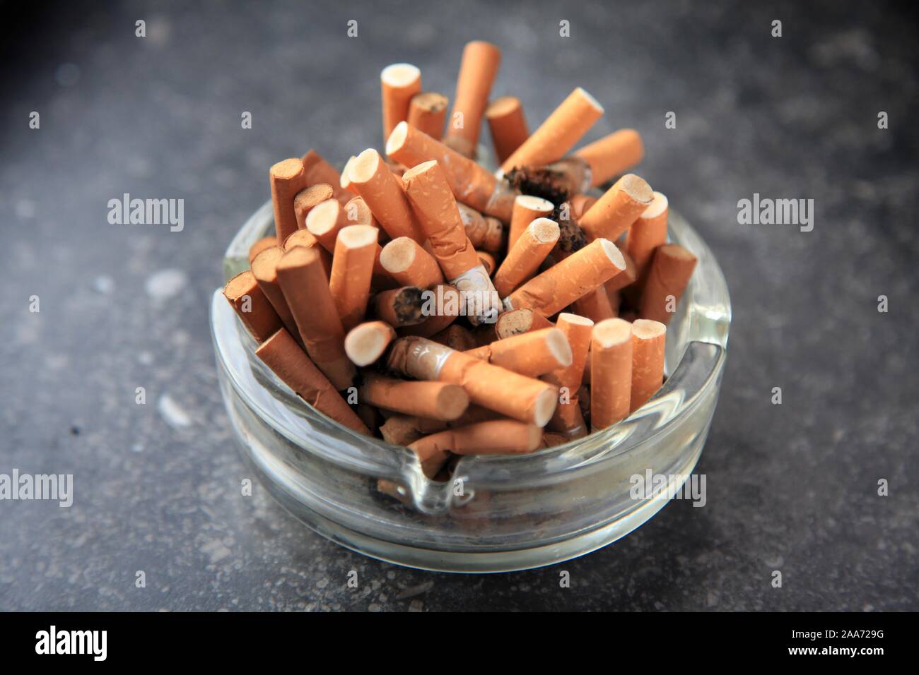 Full ashtray of cigarettes hi-res stock photography and images - Alamy