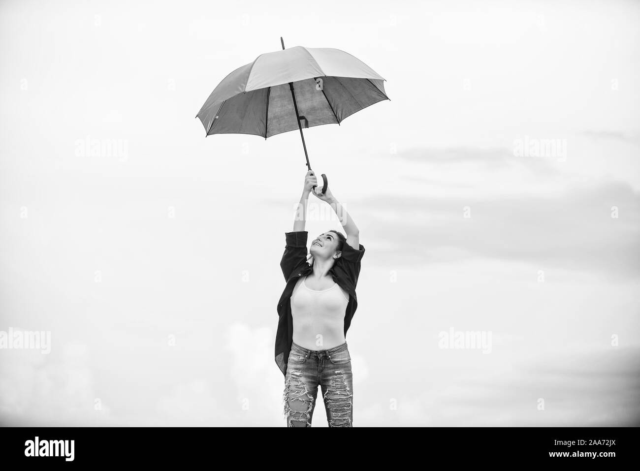 Girl on rainbow background Black and White Stock Photos & Images - Alamy