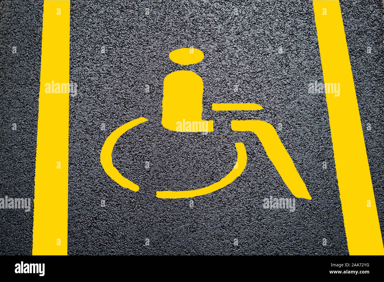 Yellow numbers and signs on the asphalt Stock Photo - Alamy