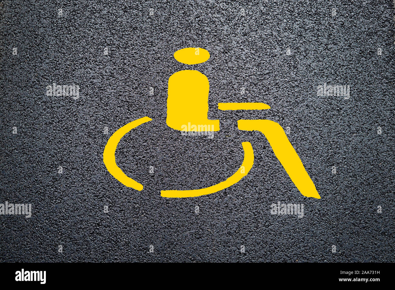 Yellow numbers and signs on the asphalt Stock Photo - Alamy