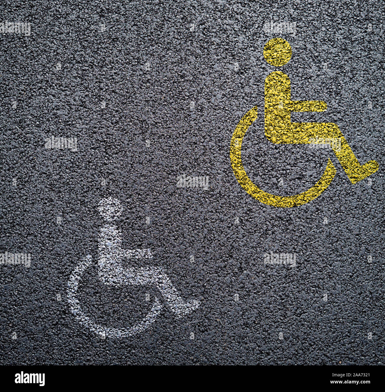 Yellow numbers and signs on the asphalt Stock Photo - Alamy