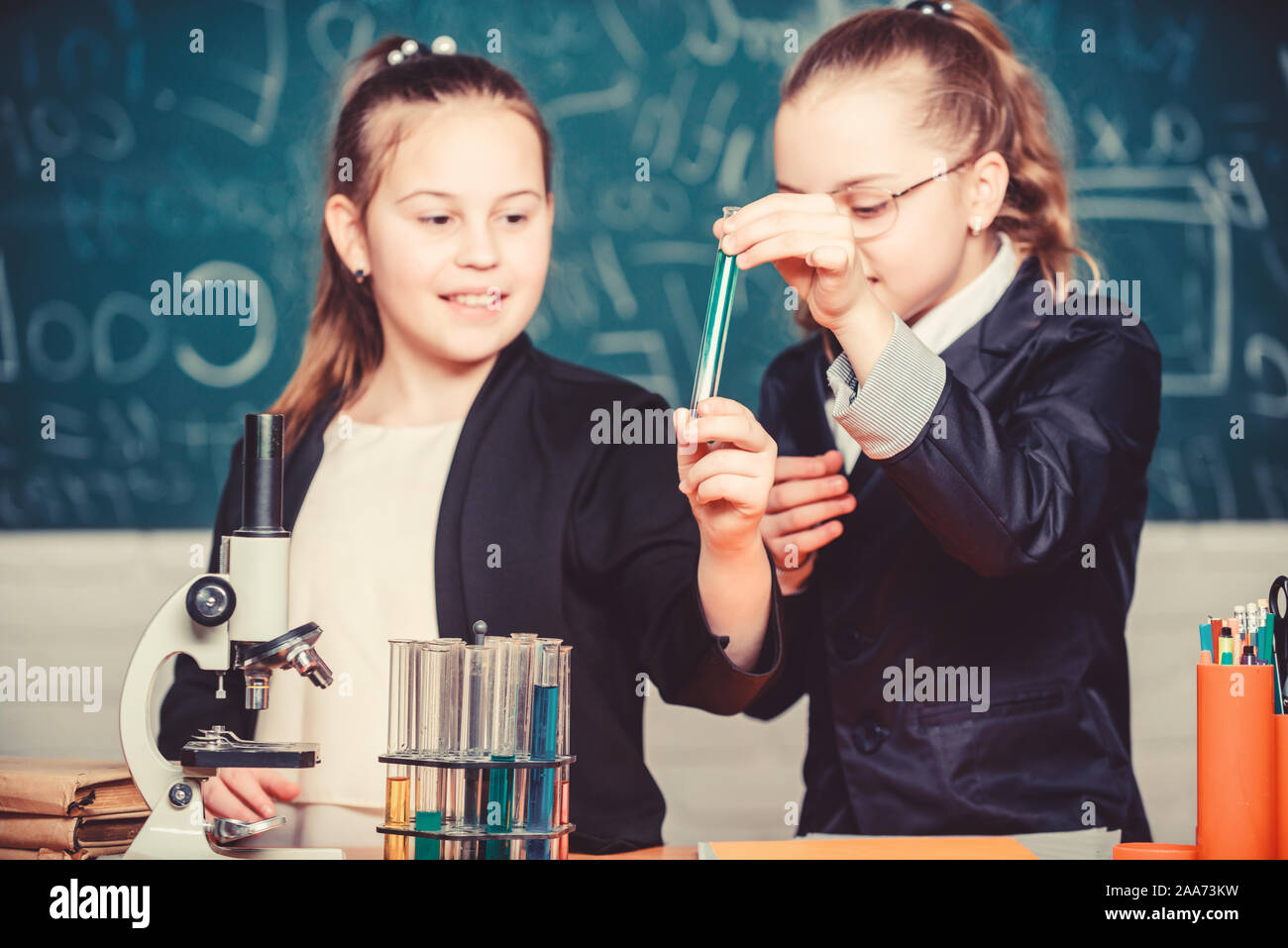 science is we. Little girls scientist with microscope. Biology lab ...