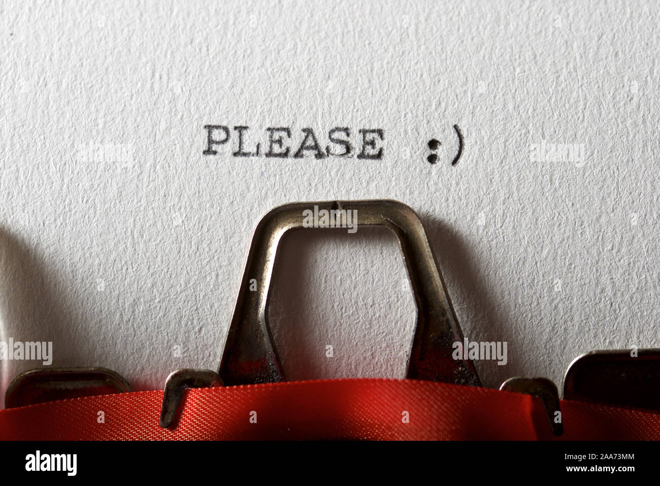 The word, Please, written with a typewriter Stock Photo - Alamy