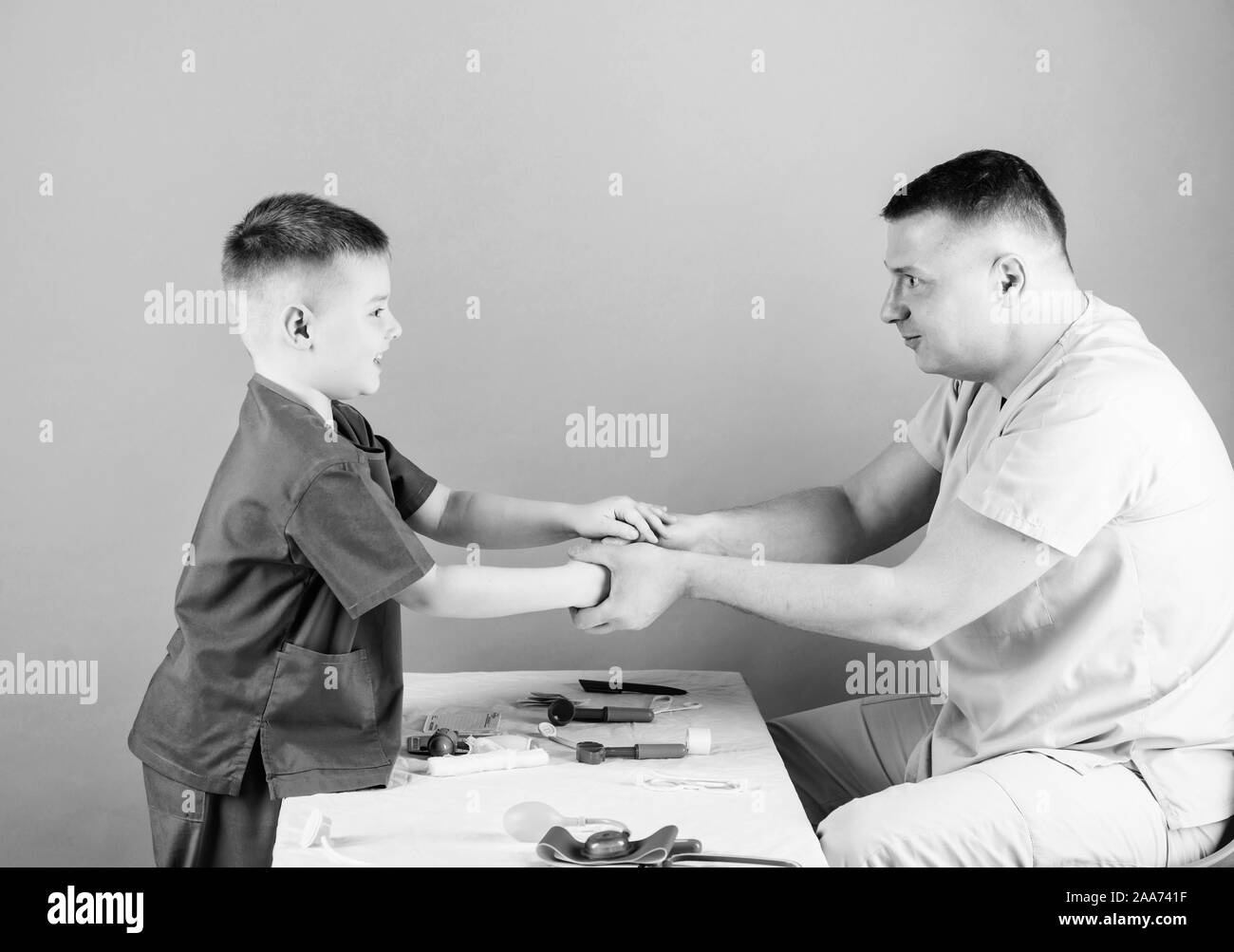 Careful pediatrician check health of kid. Medical examination. Medical ...