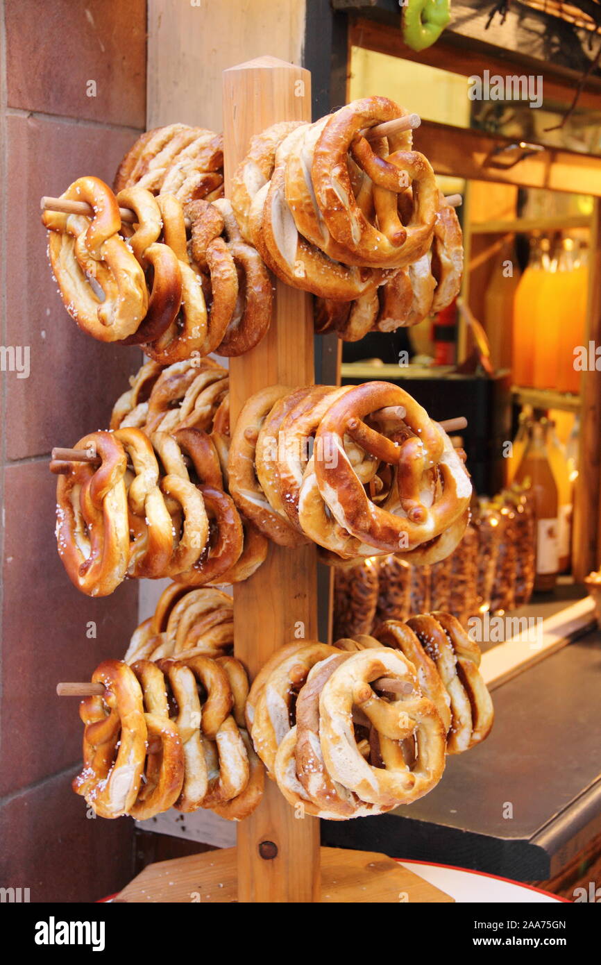 a wooden stand with lots of fresh pretzels Stock Photo - Alamy