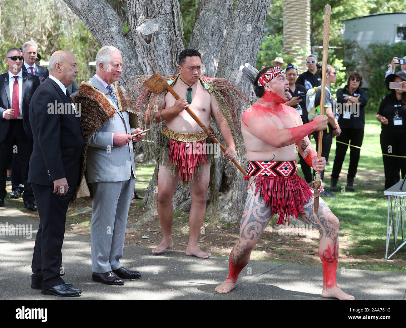 The Prince of Wales wearing a Maori cloak whilst watching a powhiri, a ...