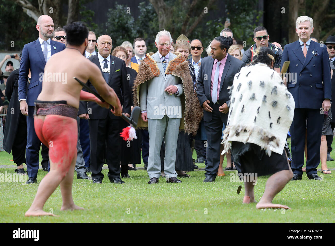 The Prince of Wales wearing a Maori cloak whilst watching a powhiri, a ...