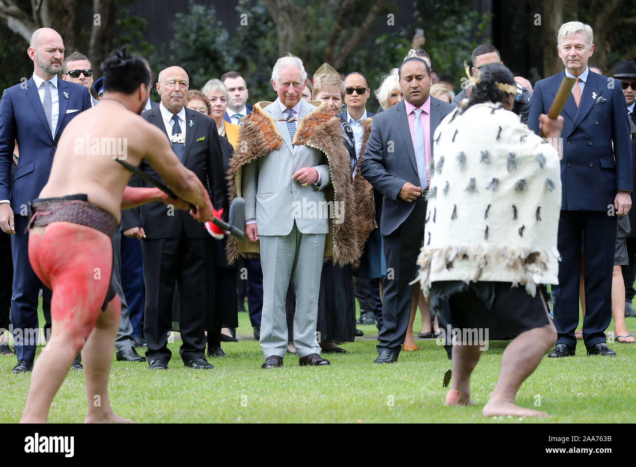The Prince of Wales wearing a Maori cloak whilst watching a powhiri, a ...