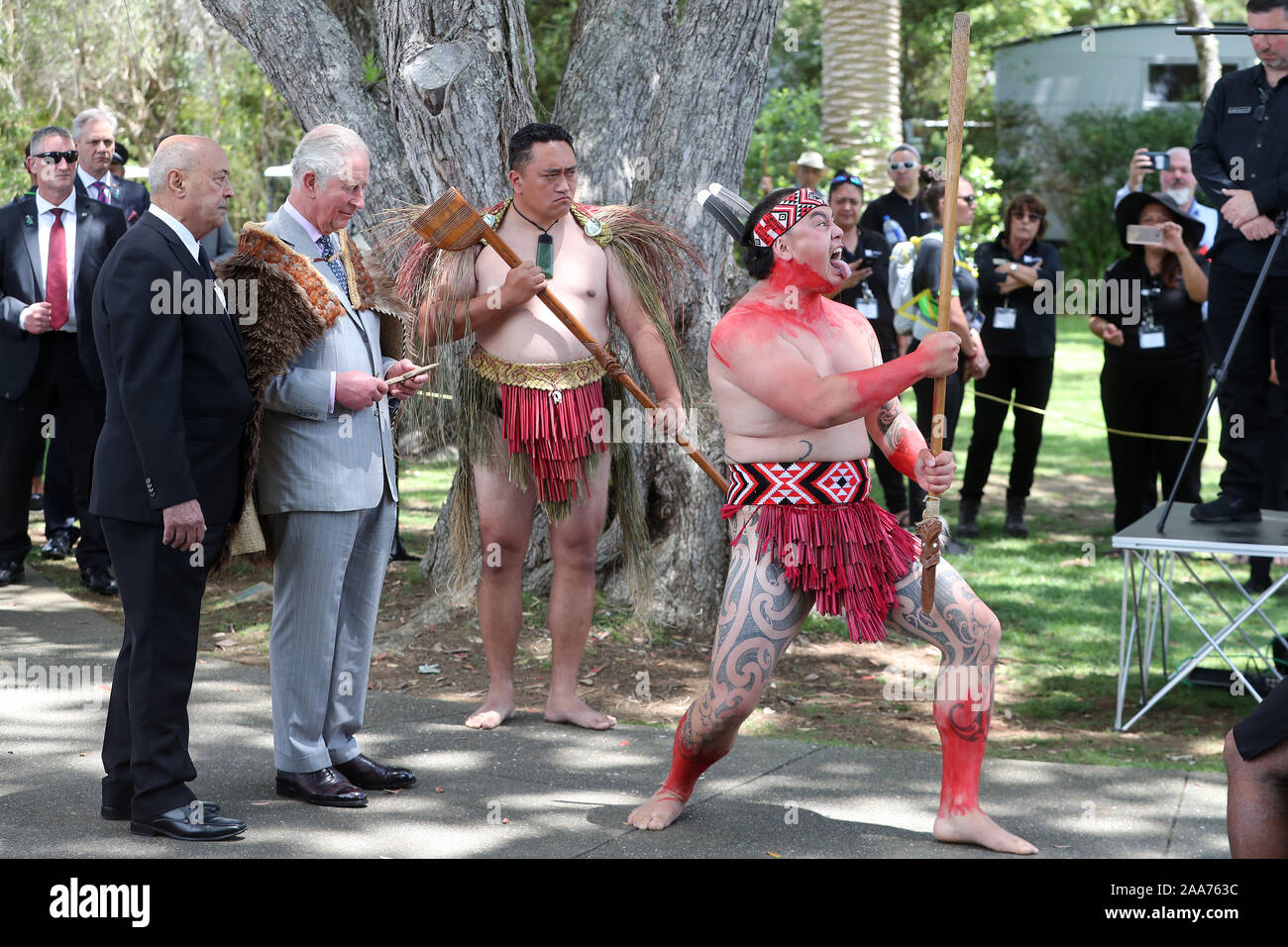 The Prince of Wales wearing a Maori cloak whilst watching a powhiri, a ...