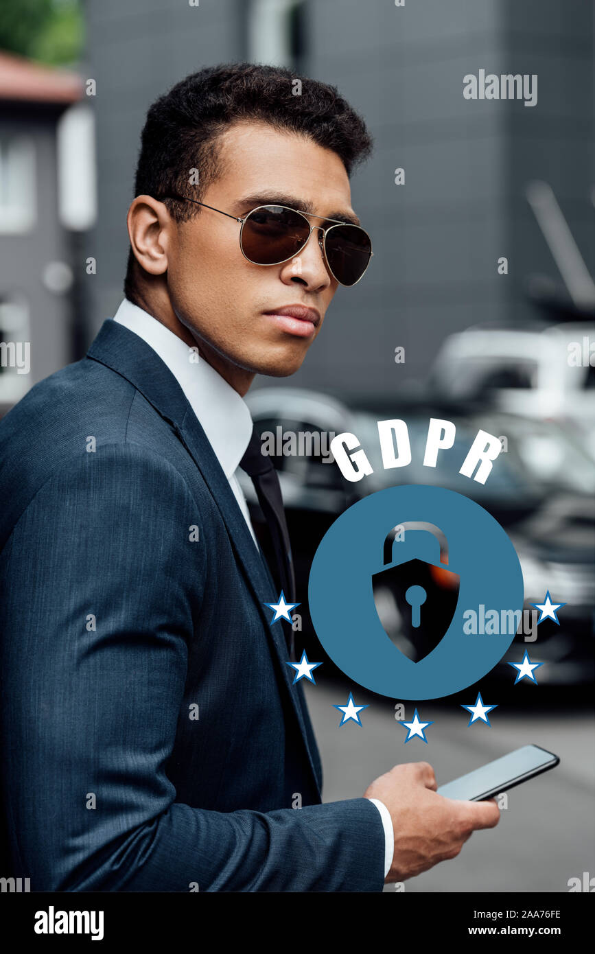 handsome and confident african american businessman in suit and ...