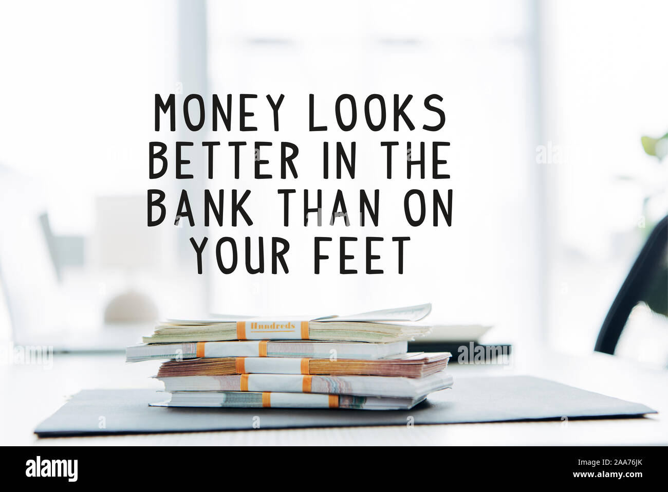 dollar banknotes on table in office with money looks better in the bank ...