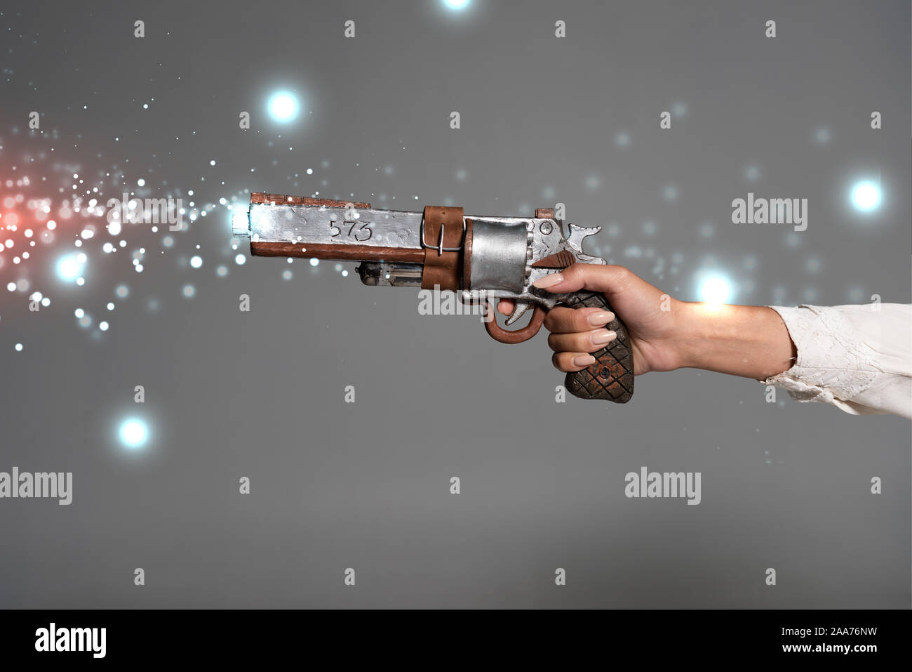 Woman holding revolver hi-res stock photography and images - Alamy
