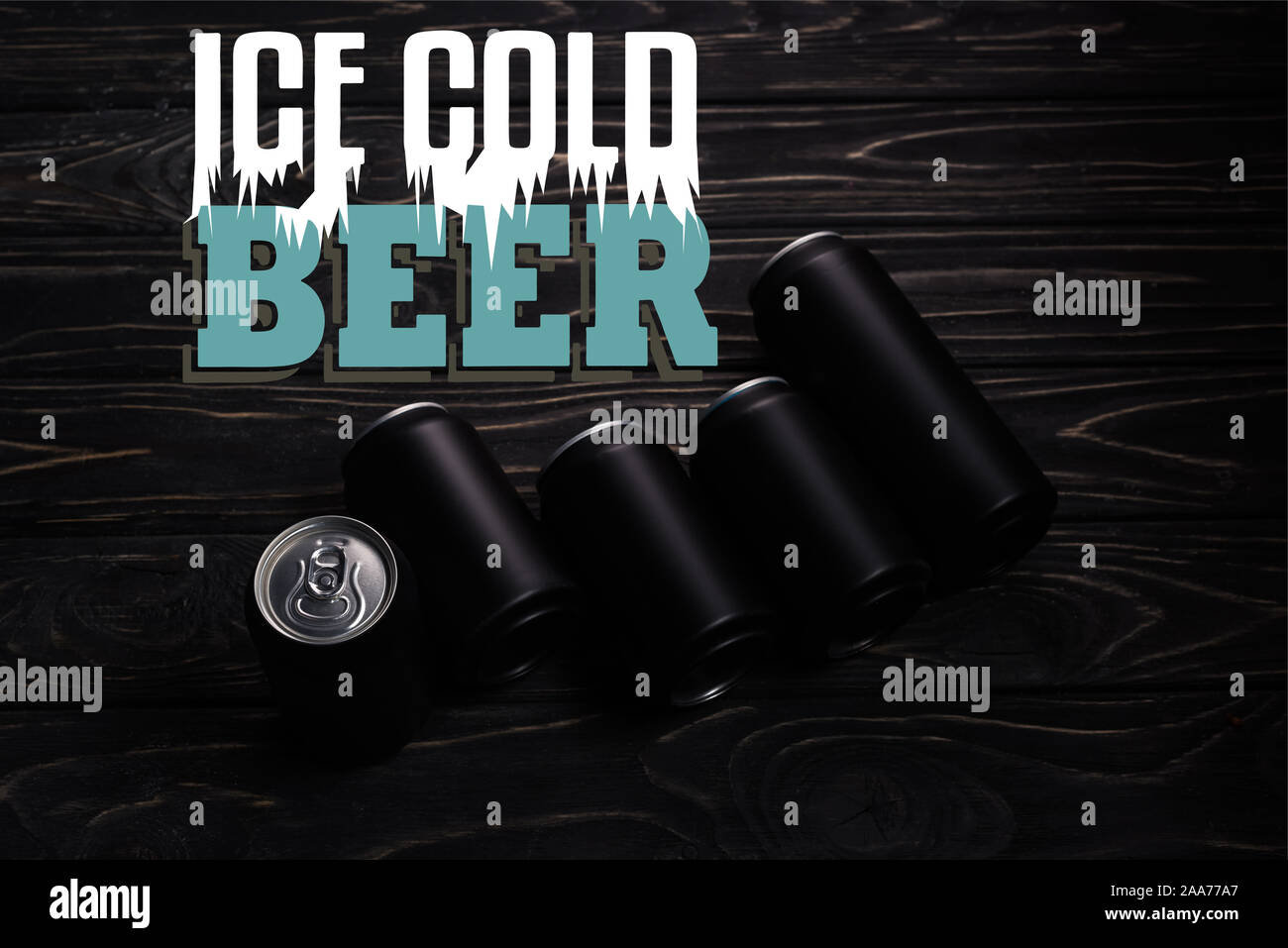black aluminum cans of beer on wooden table with ice cold beer ...