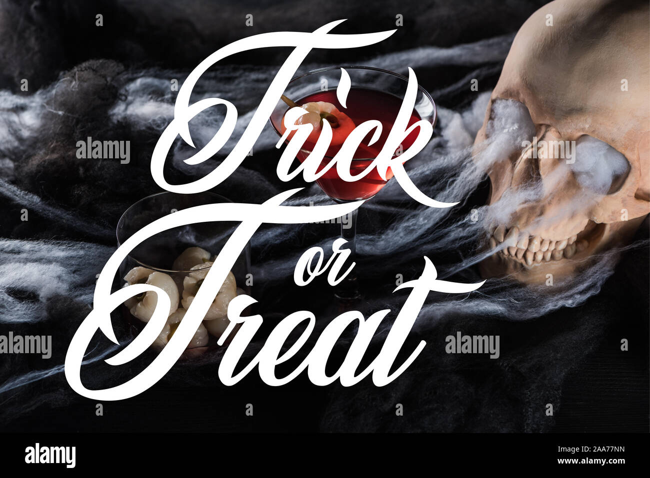 spooky human skull in red lighting, Halloween decoration with trick or ...