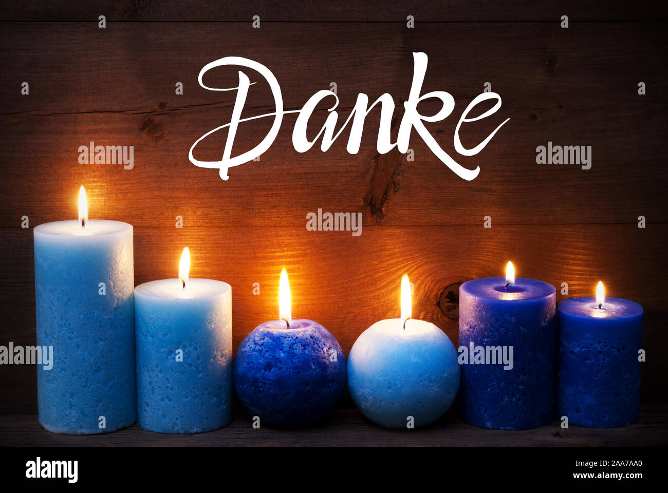 Romantic Turquoise Candle Light , Danke Means Thank You Stock Photo - Alamy