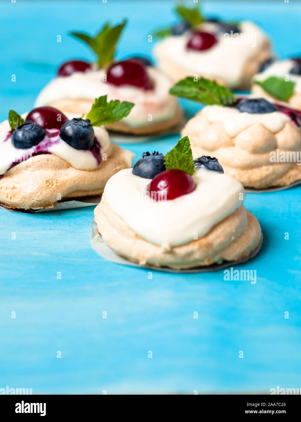 Dessert anna pavlova with cherry blueberry cream Stock Photo - Alamy
