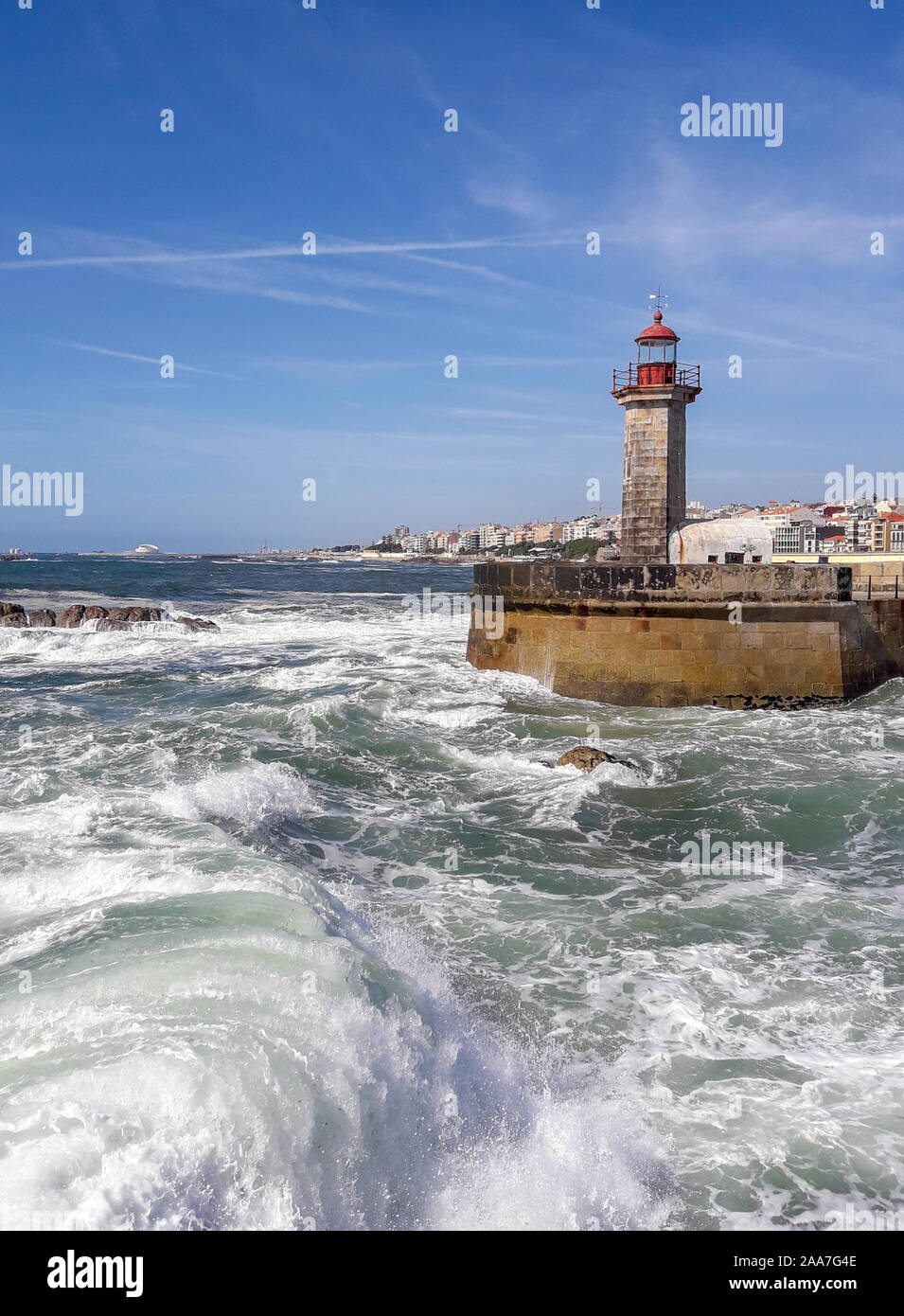 lighthouse at Atlantic ocean with big wave Stock Photo - Alamy